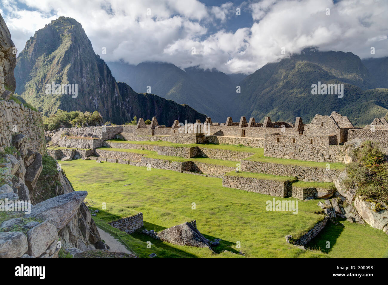 Terraces and old building ruins in Machu Picchu, Peru Stock Photo - Alamy