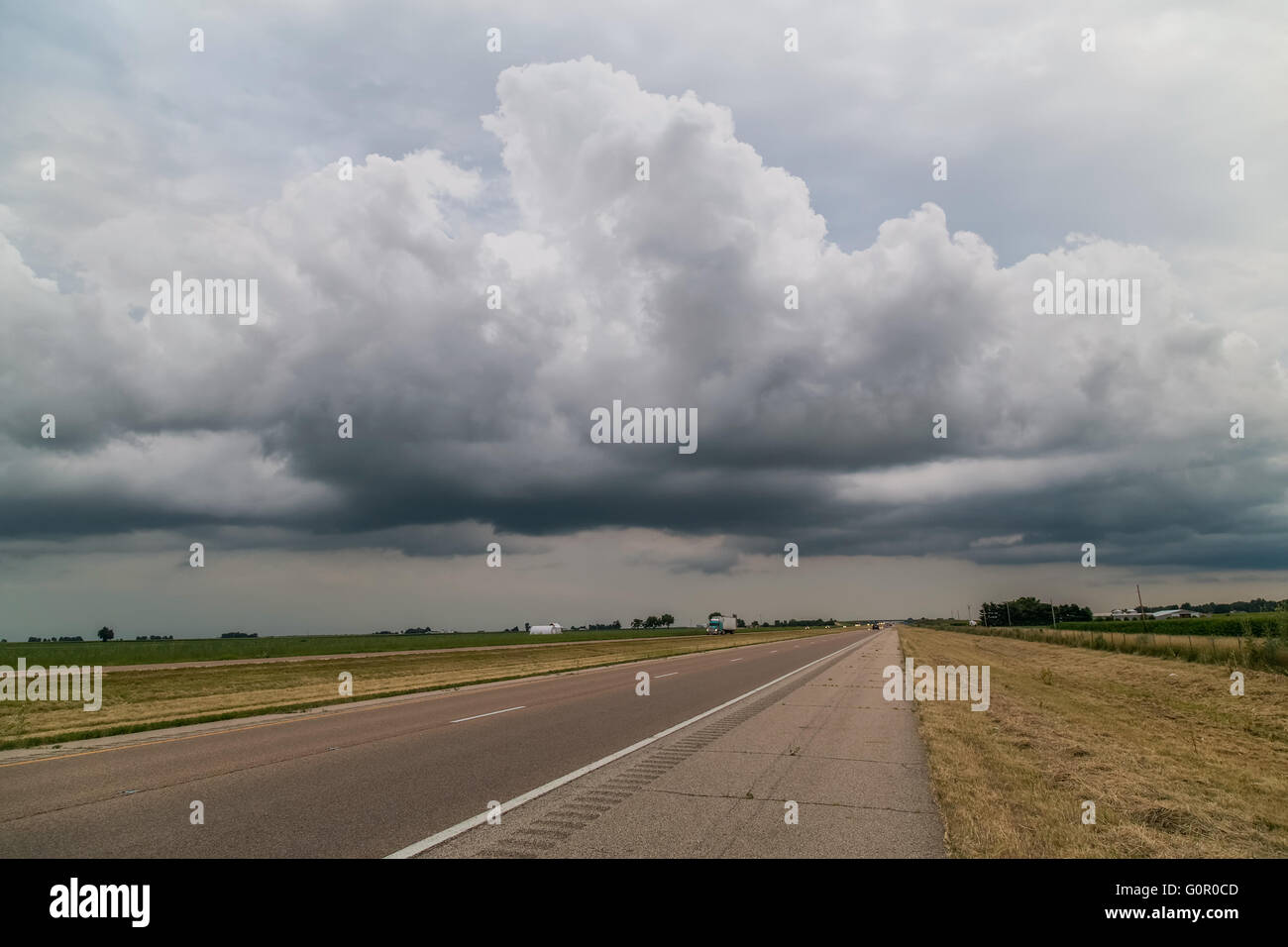 State Highway in Midwest with clouds and sunset Stock Photo - Alamy