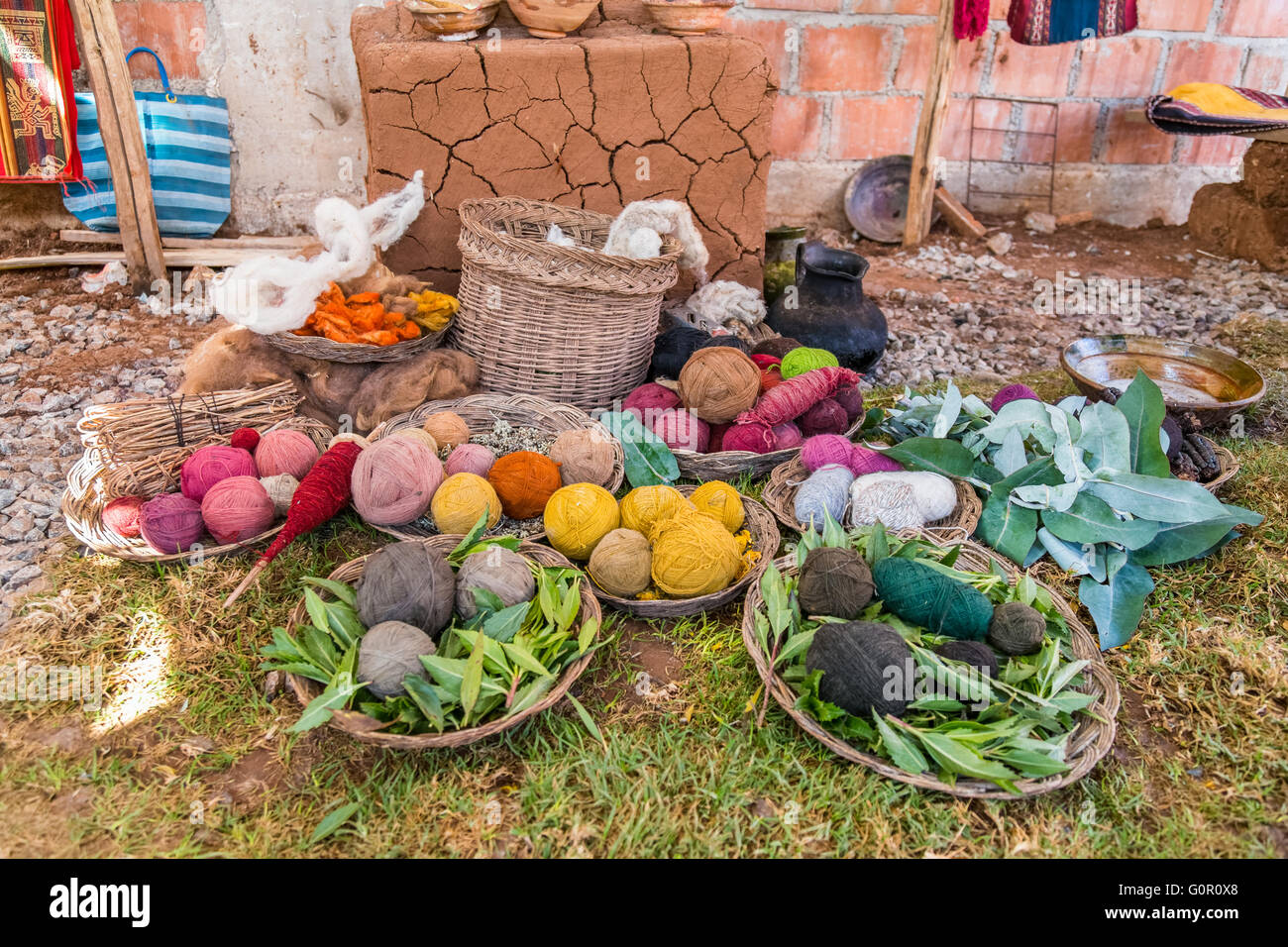 Colorful yarn balls in traditional baskets in Andes Mountains near ...