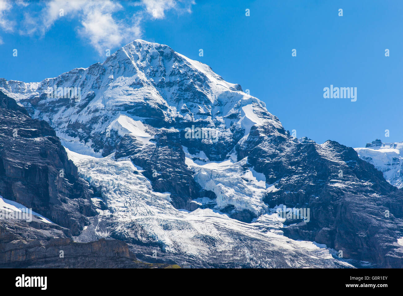 Close view of the famous peak Monch of the swiss Alps on Bernese ...