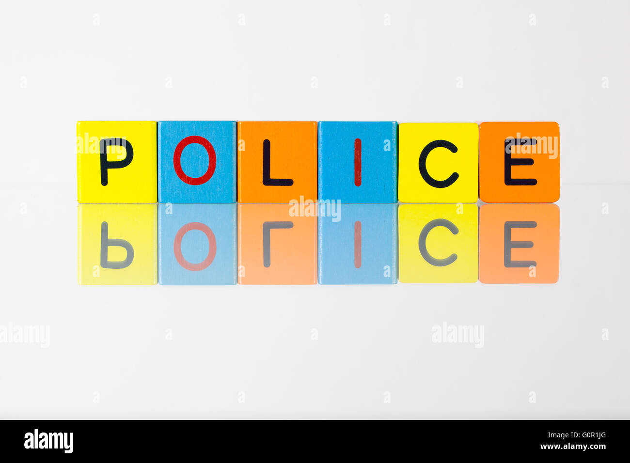 Police - an inscription from children's wooden blocks Stock Photo - Alamy