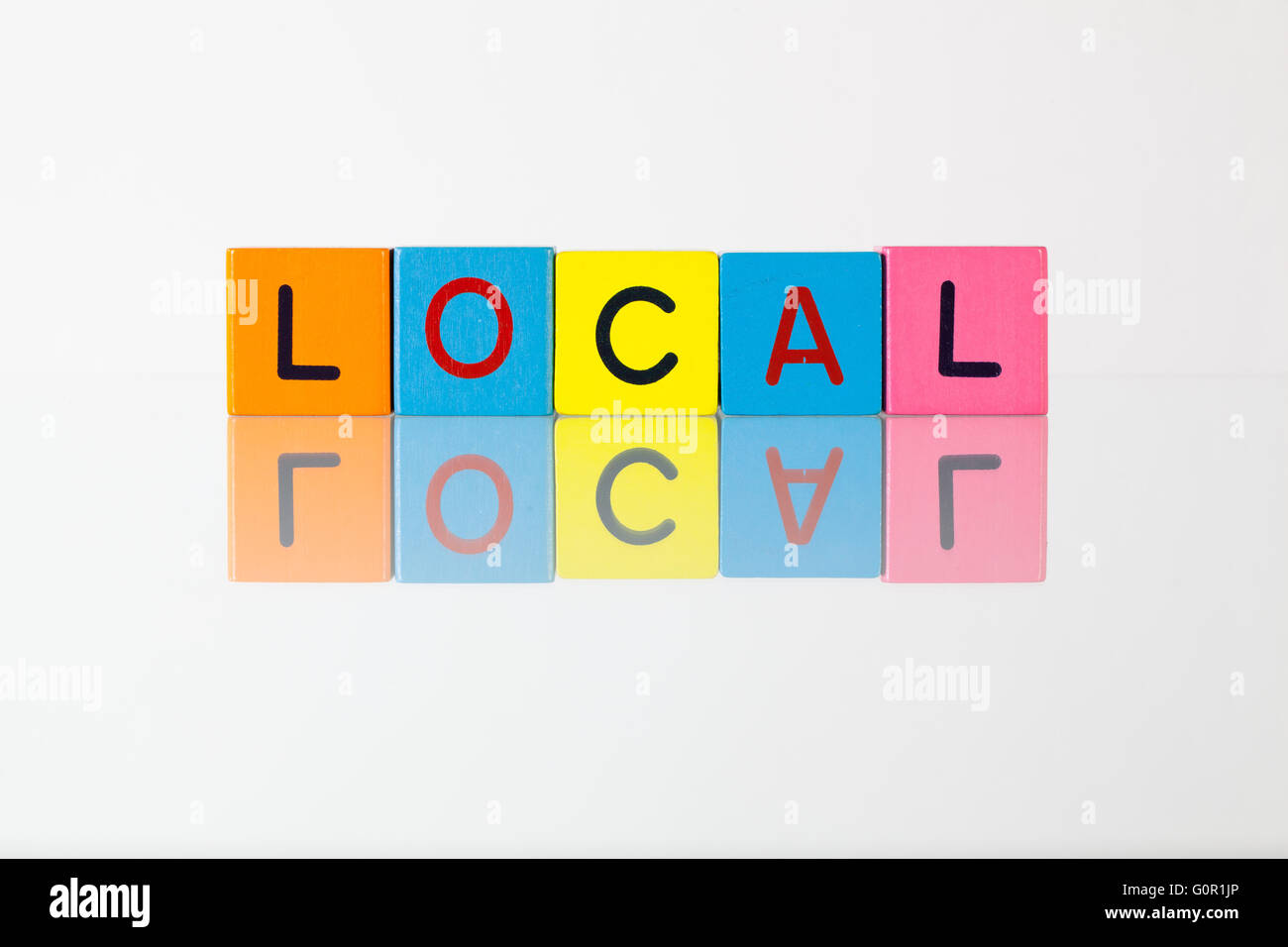 Local - an inscription from children's wooden blocks Stock Photo - Alamy