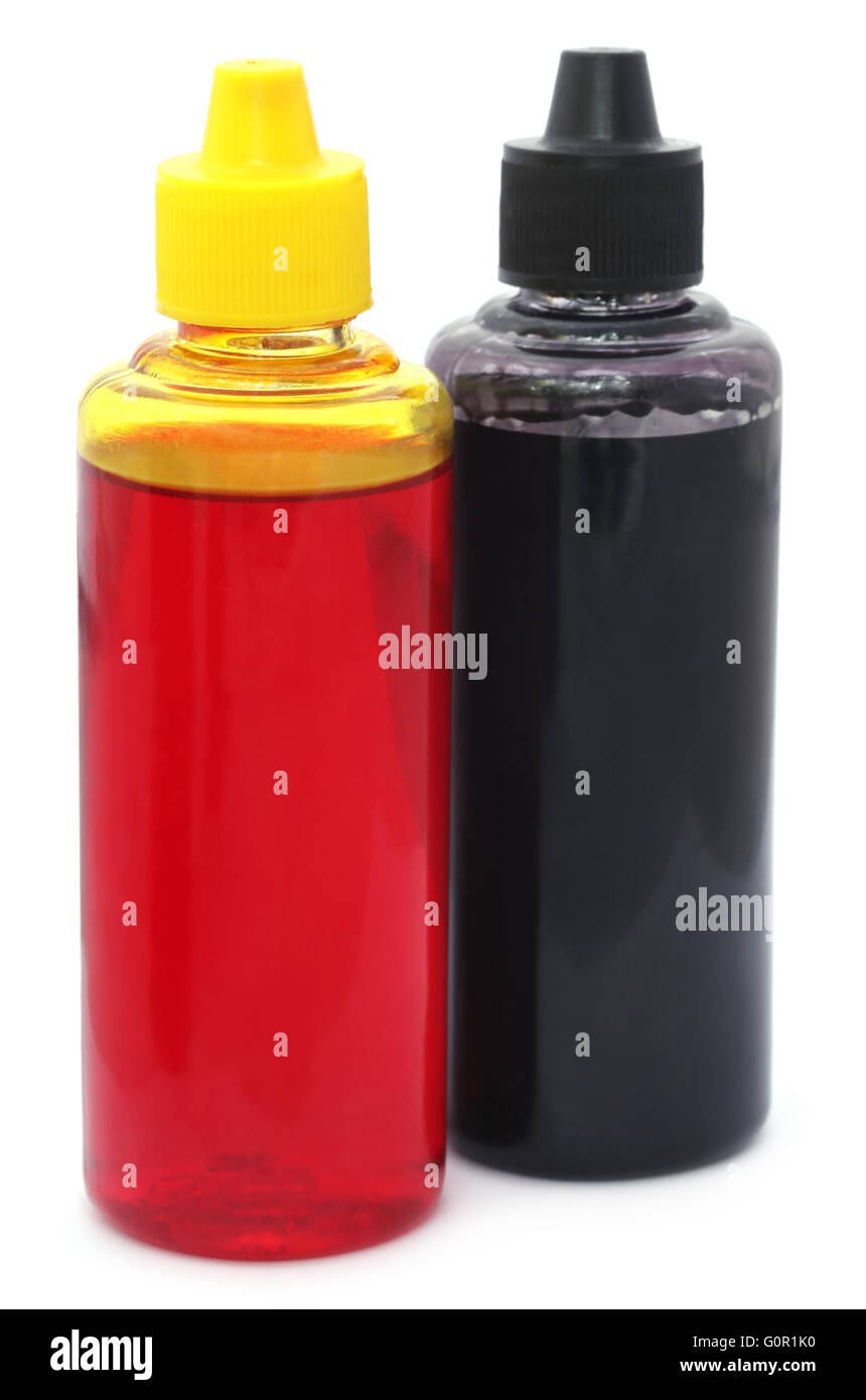 Two printer ink bottles over white background Stock Photo - Alamy