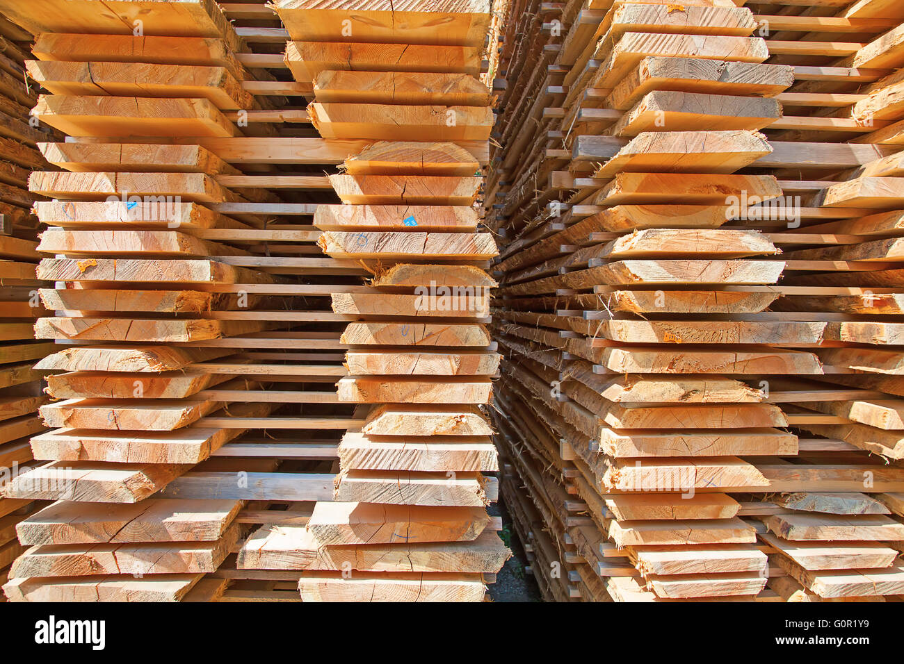 Stack of new wooden studs at the lumber yard Stock Photo - Alamy
