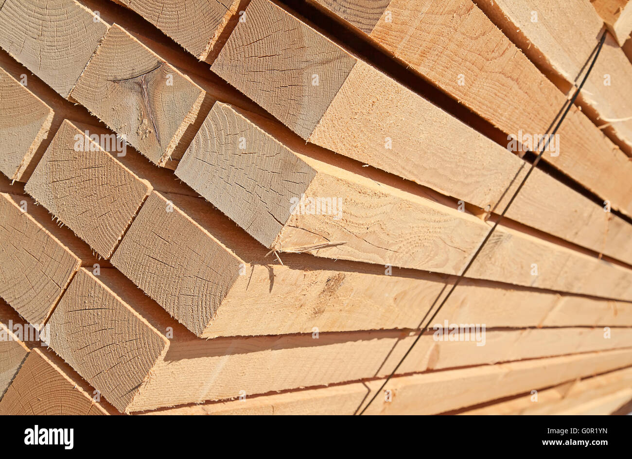 Stack of new wooden studs at the lumber yard Stock Photo - Alamy