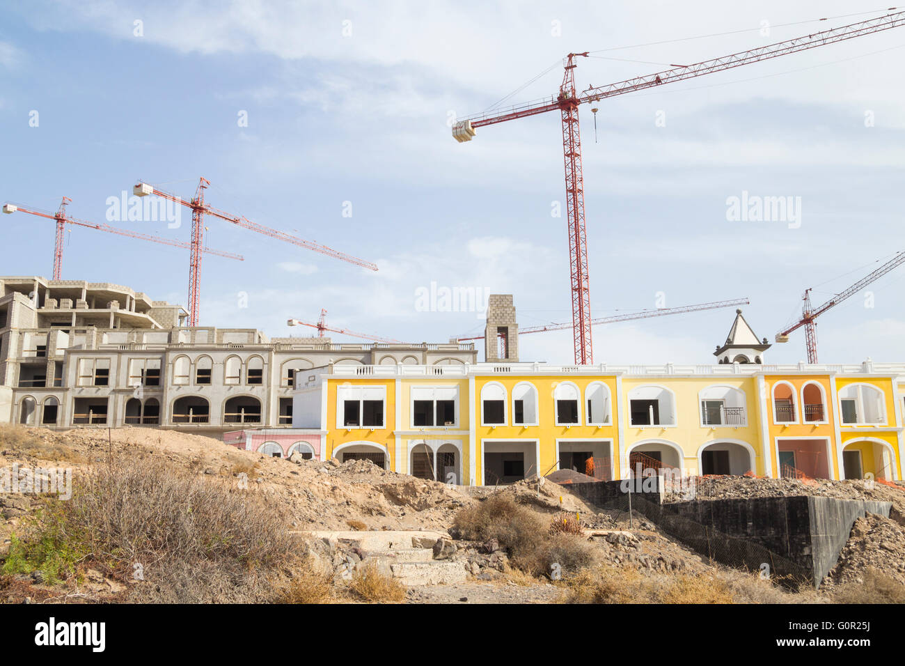 Unfinished/ hotel construction site overlooking beach bar in Spain ...