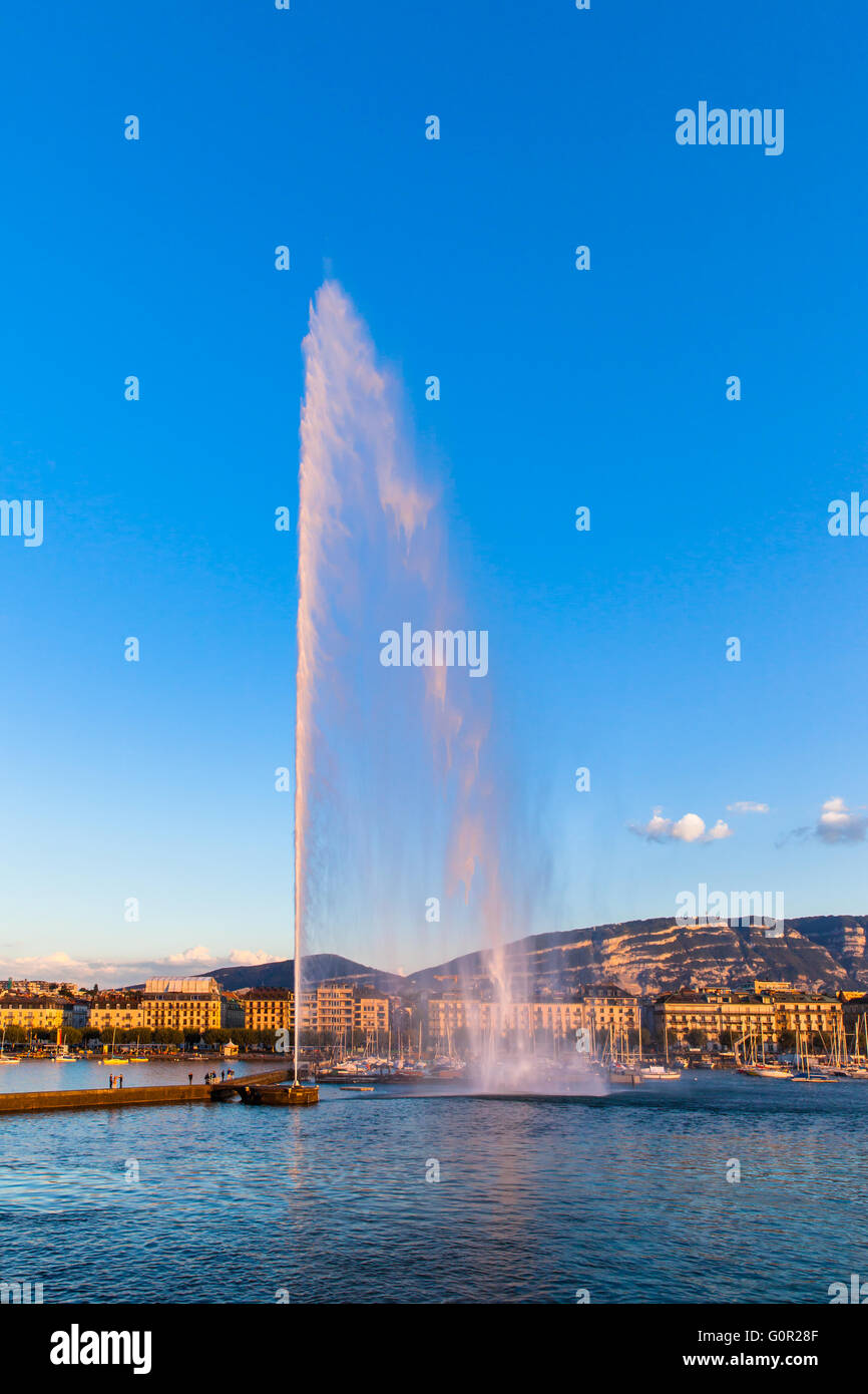 Beautiful view of the water jet fountain in the lake of Geneva and the ...