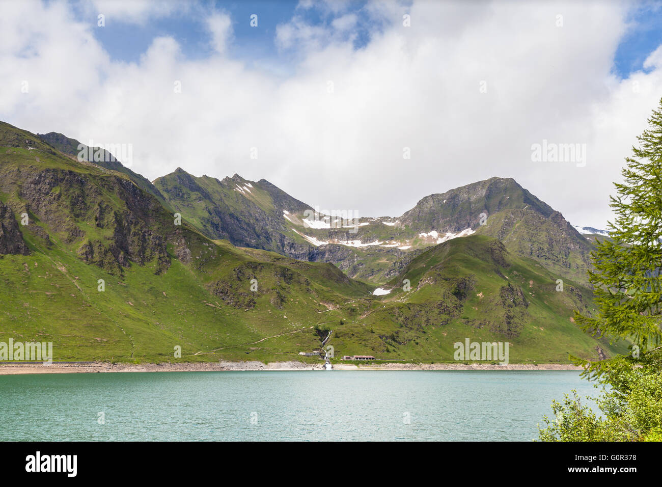 Stunning view of the lake of Ritom with the alps in background, Piora ...
