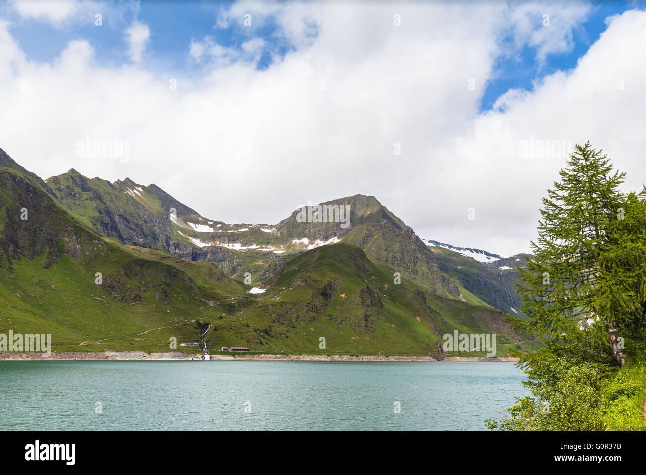 Stunning view of the lake of Ritom with the alps in background, Piora ...