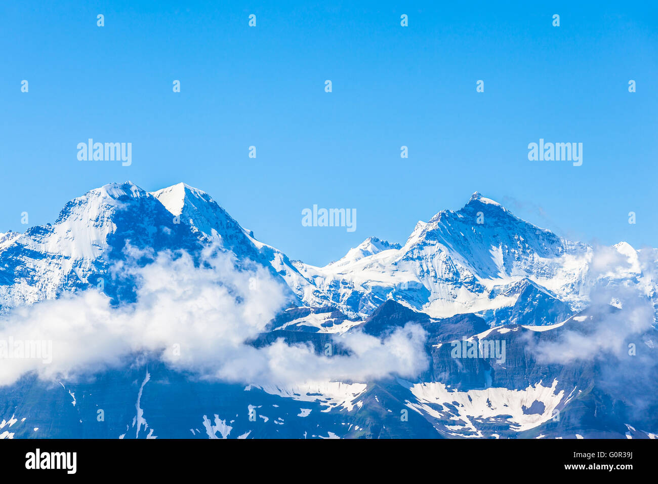 Stunning view of the three famous peaks of the swiss Alps on Bernese ...