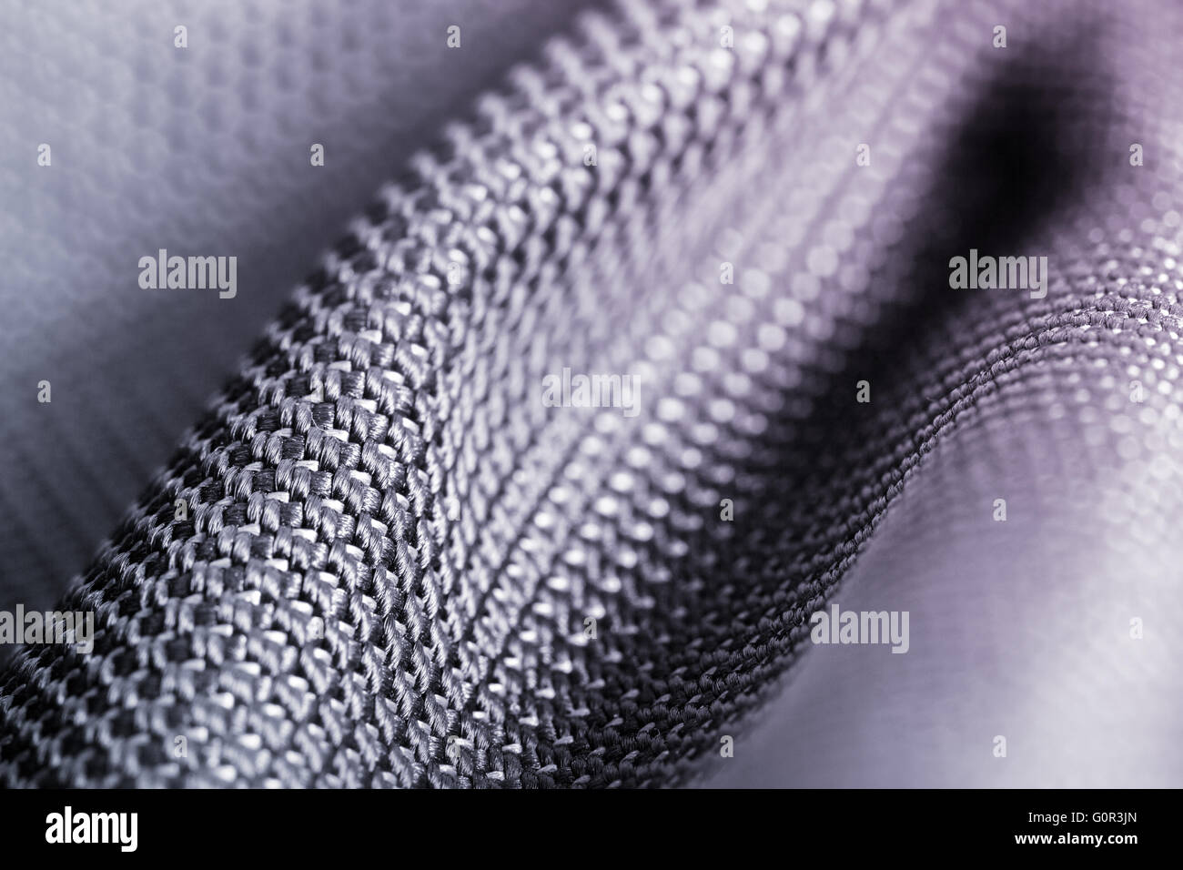 Textile and fabric industry background Stock Photo - Alamy
