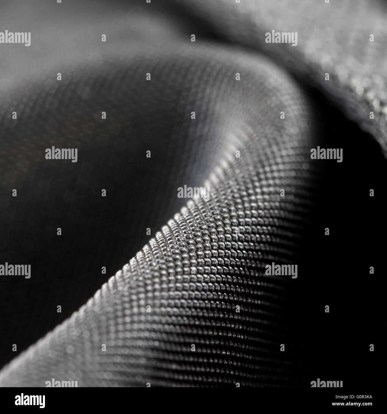 Textile and fabric industry background Stock Photo - Alamy