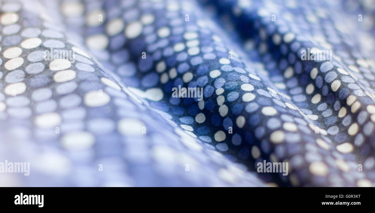 Textile and fabric industry background Stock Photo - Alamy