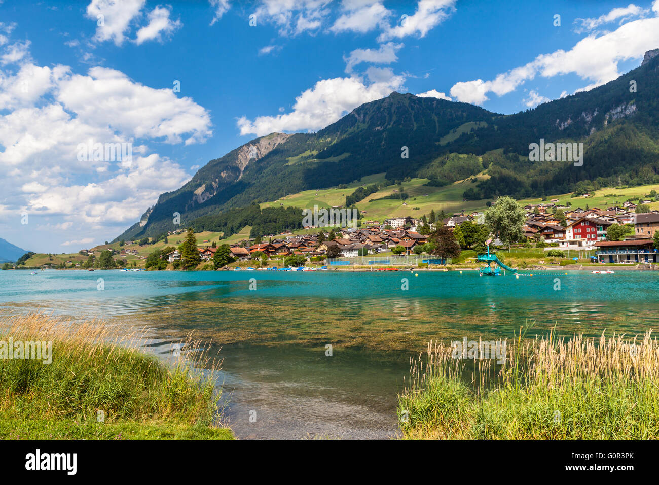 Stunning view of the small town Lungern on the lake side of Lungernsee ...