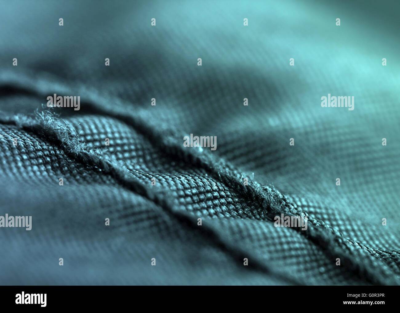 Textile and fabric industry background Stock Photo - Alamy
