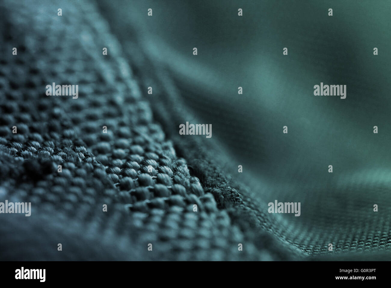 Textile and fabric industry background Stock Photo - Alamy