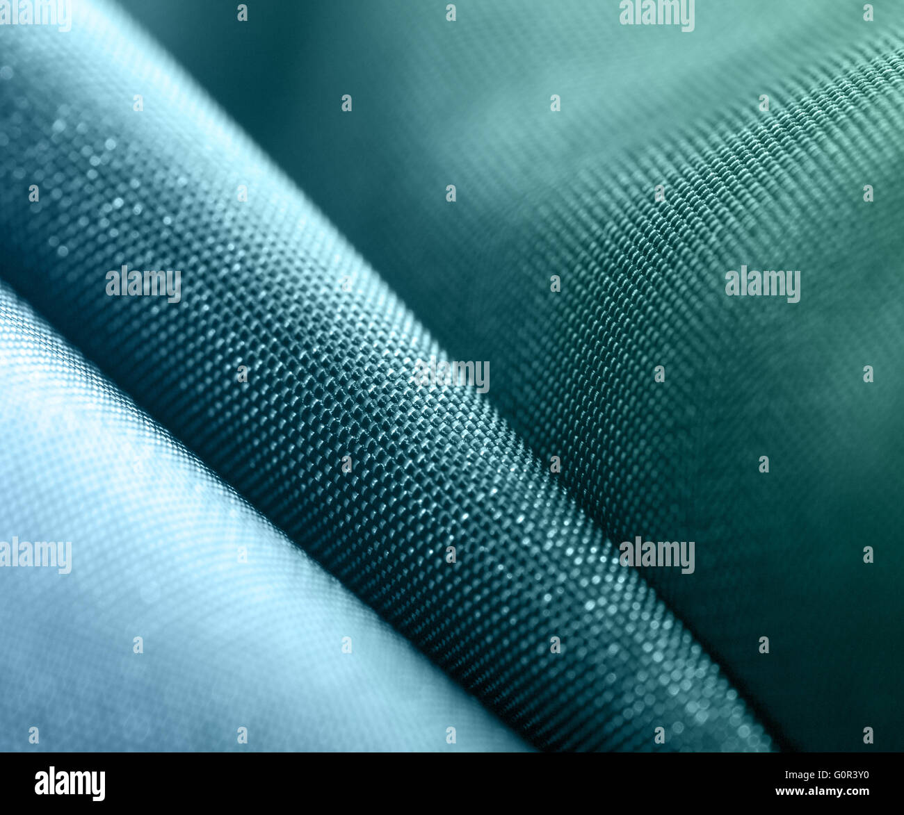 Textile and fabric industry background Stock Photo - Alamy