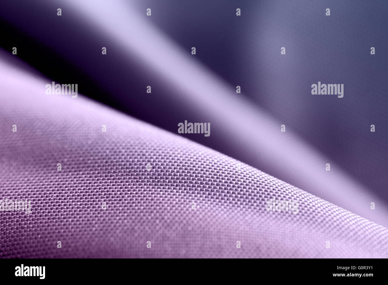 Textile and fabric industry background Stock Photo - Alamy