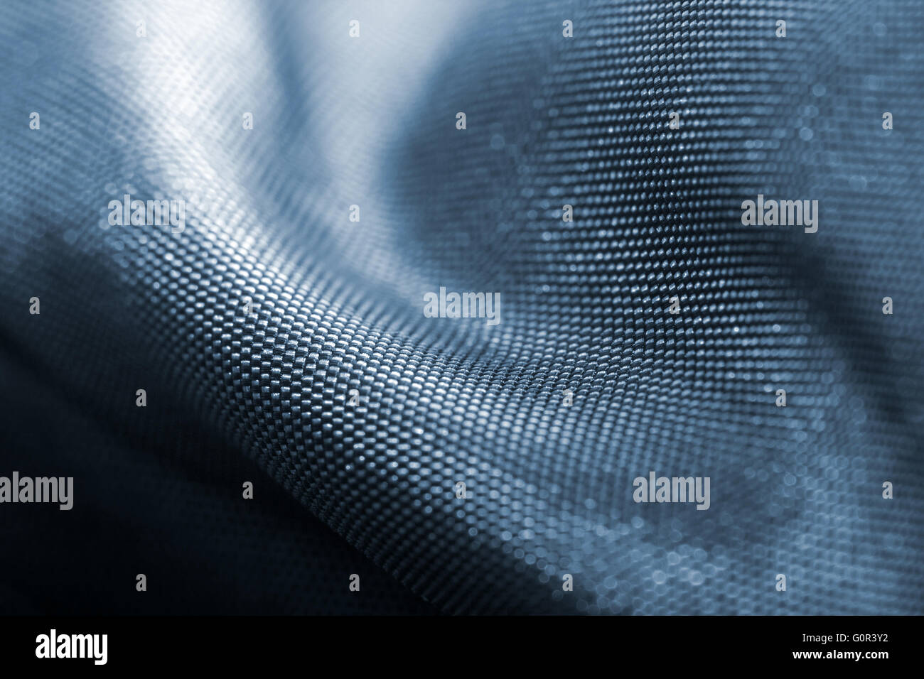 Textile and fabric industry background Stock Photo - Alamy