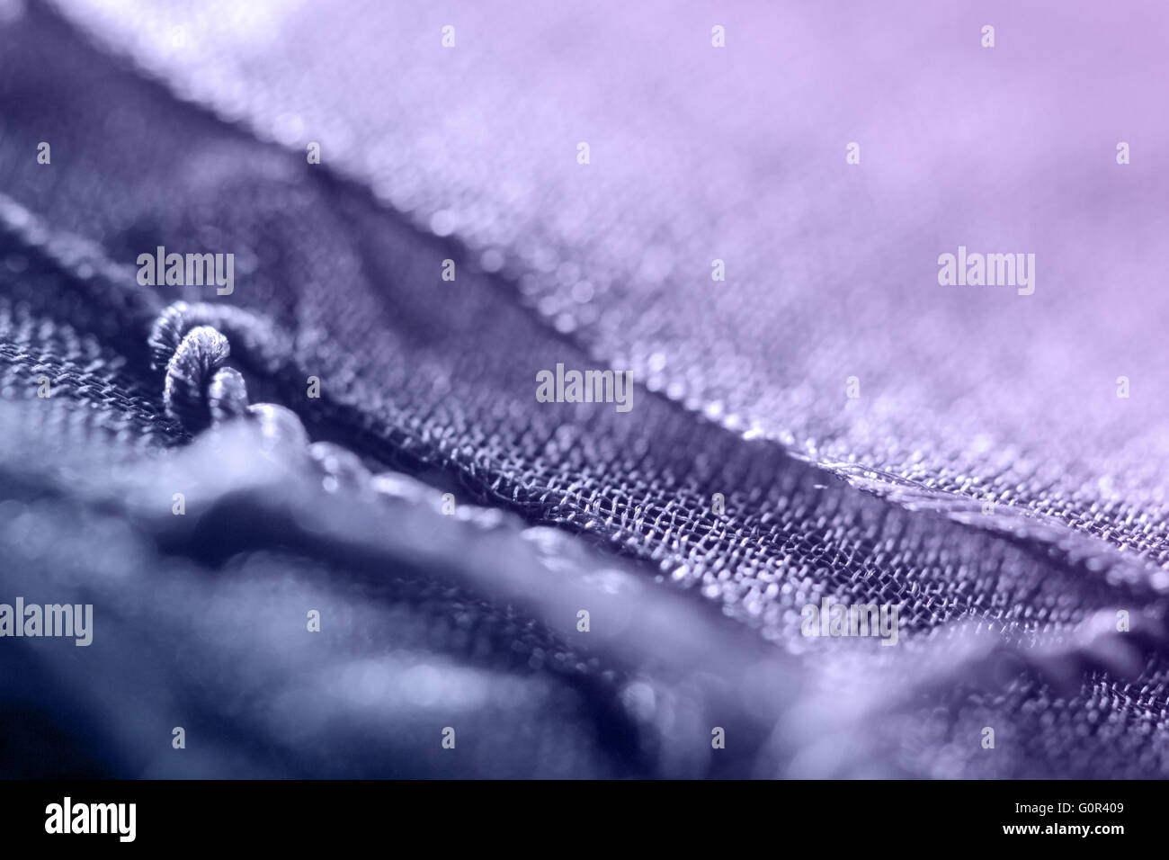 Textile and fabric industry background Stock Photo - Alamy