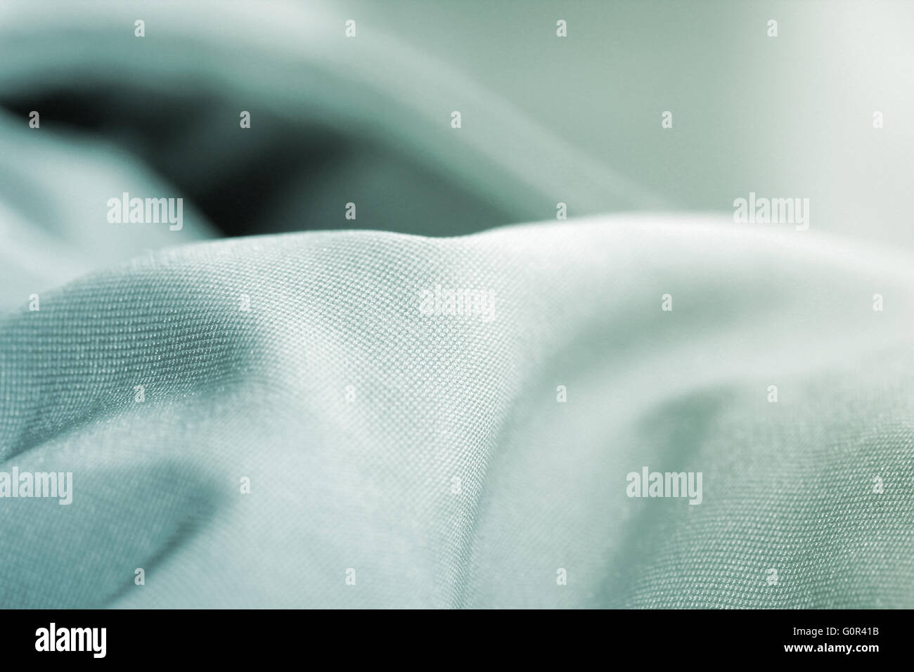 Silk fabric close up background, fashion industry photo Stock Photo - Alamy