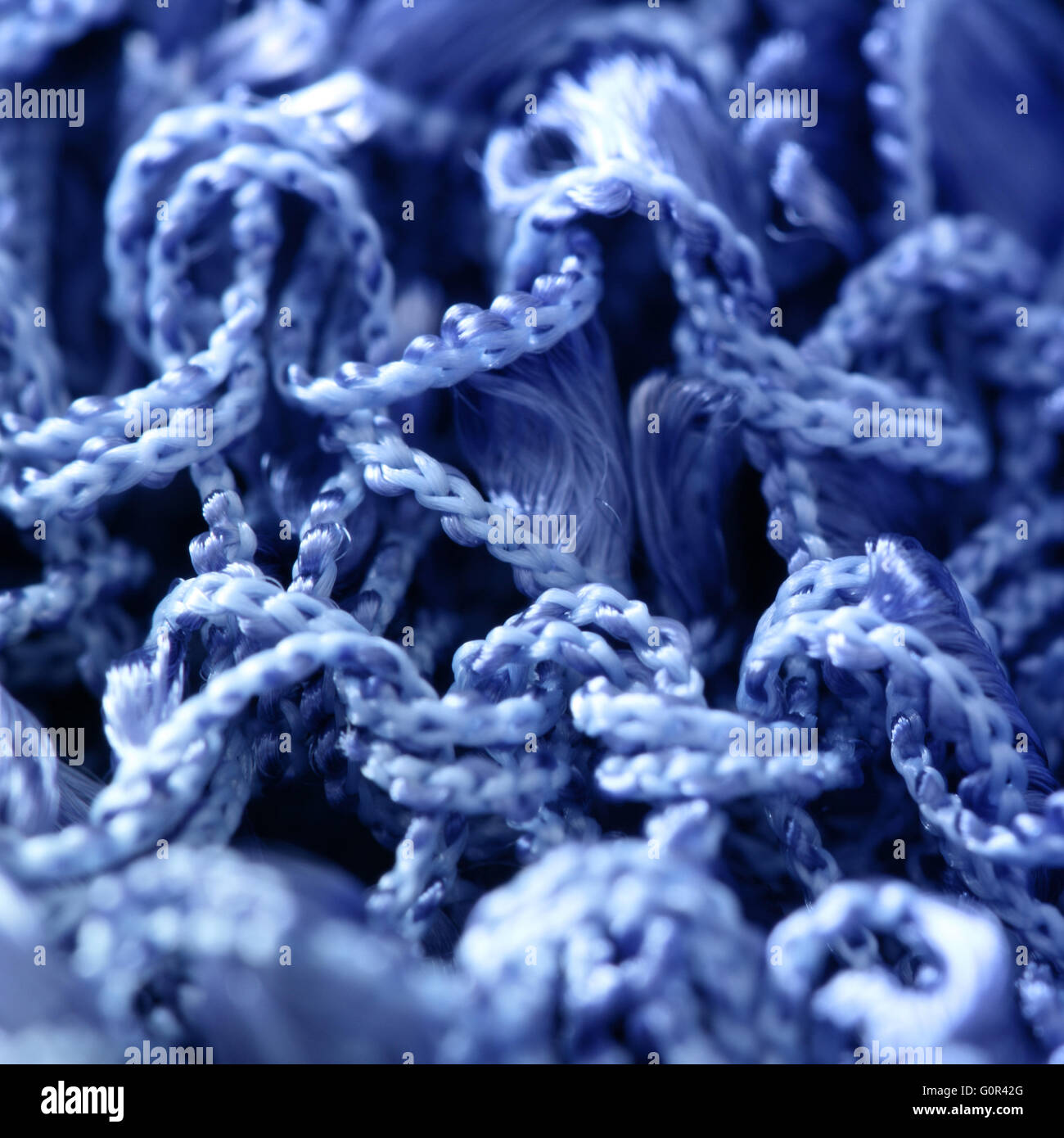 Textile and fabric industry background Stock Photo - Alamy