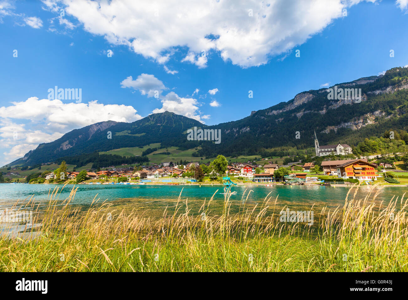 Stunning view of the small town Lungern on the lake side of Lungernsee ...