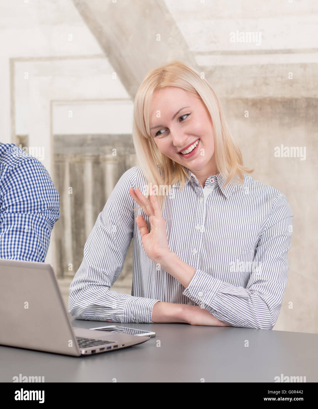 Blonde using Internet Stock Photo - Alamy