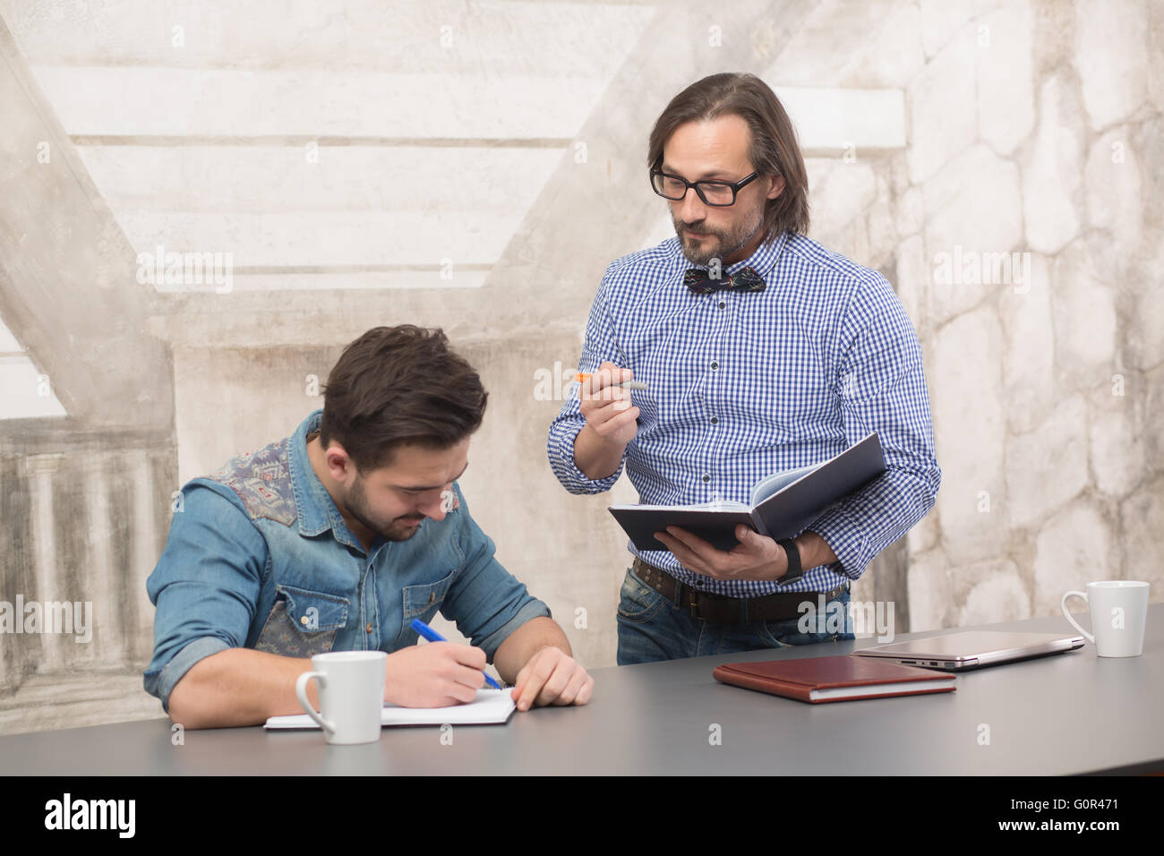 Boss and worker Stock Photo - Alamy