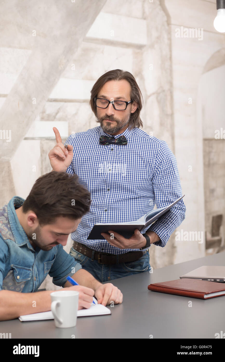 Boss and worker Stock Photo - Alamy