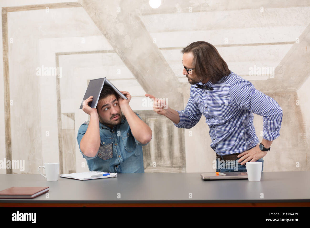 Boss and worker Stock Photo - Alamy