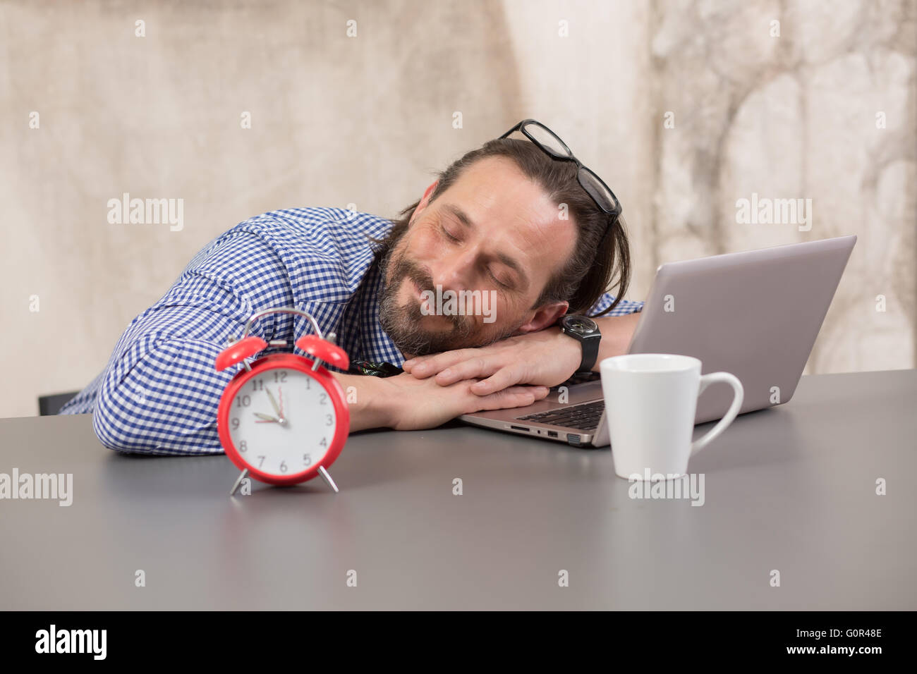 Very tired businessman Stock Photo - Alamy