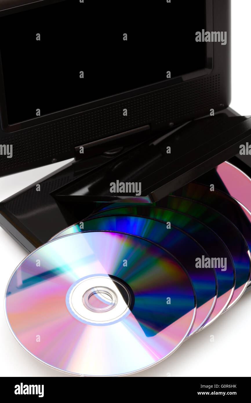TV with a dvd disks on a white background Stock Photo - Alamy