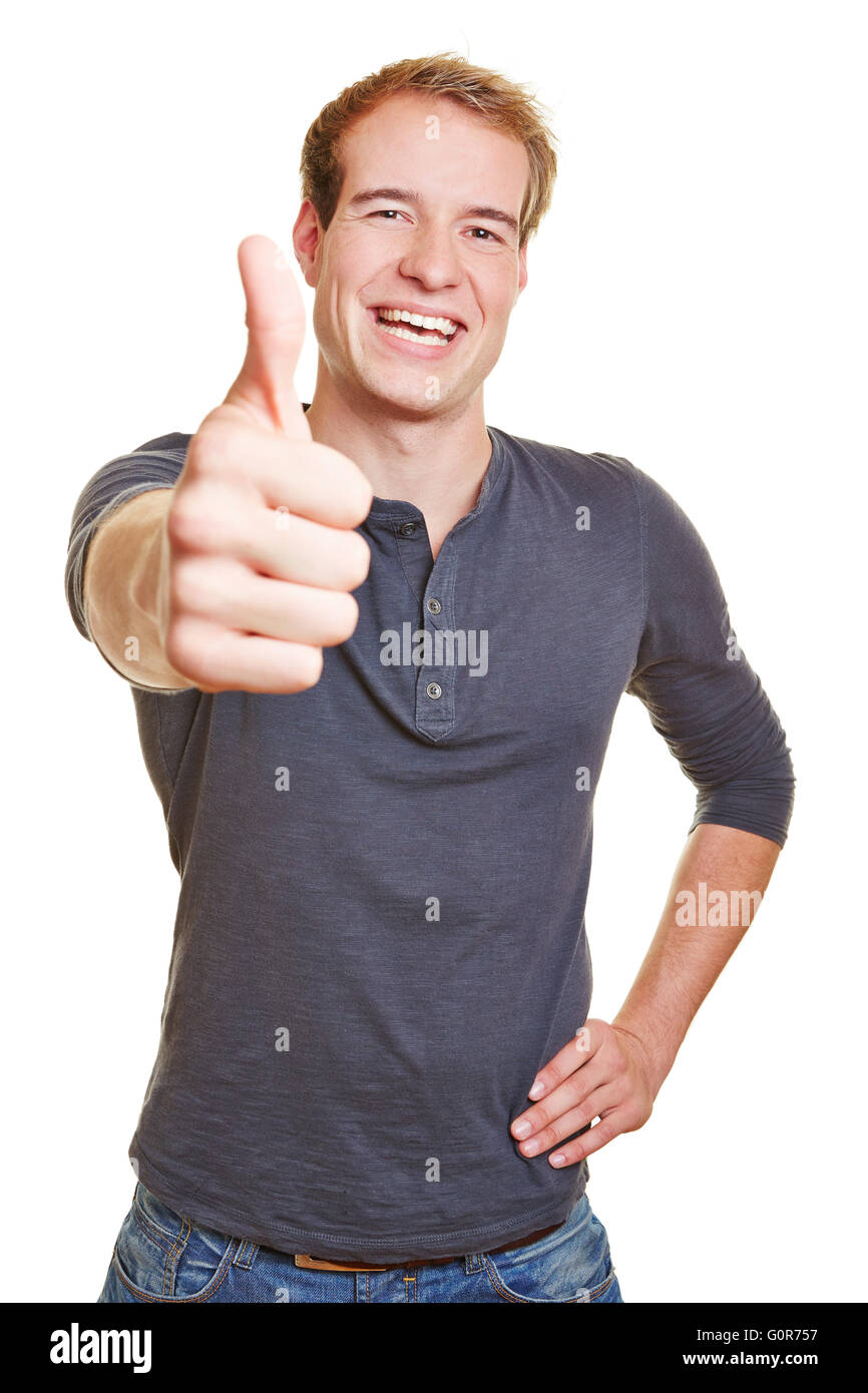 Happy young male winner congratulates with his thumbs up Stock Photo ...