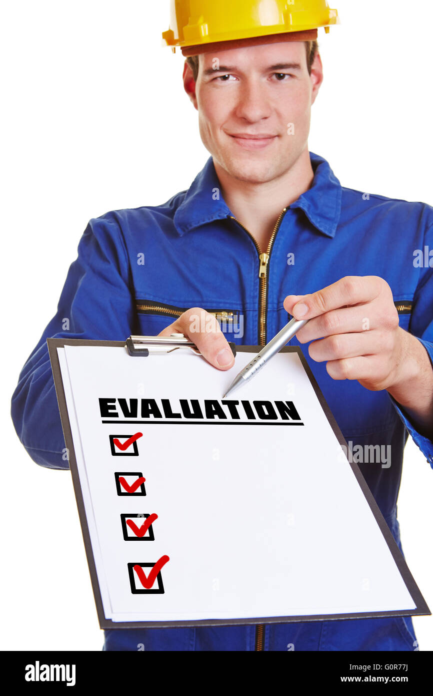Construction worker holding evaluation checklist and asking for an ...