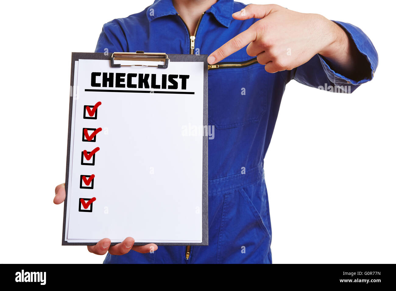 Construction worker holding clipboard with checklist and pointing with ...