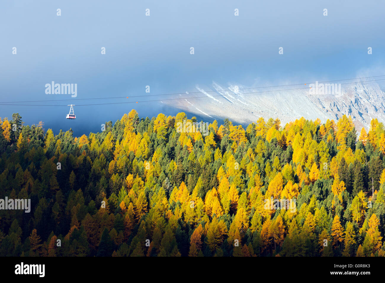 Europe, Switzerland, Graubunden, Engadine, St Moritz, cable car above a ...