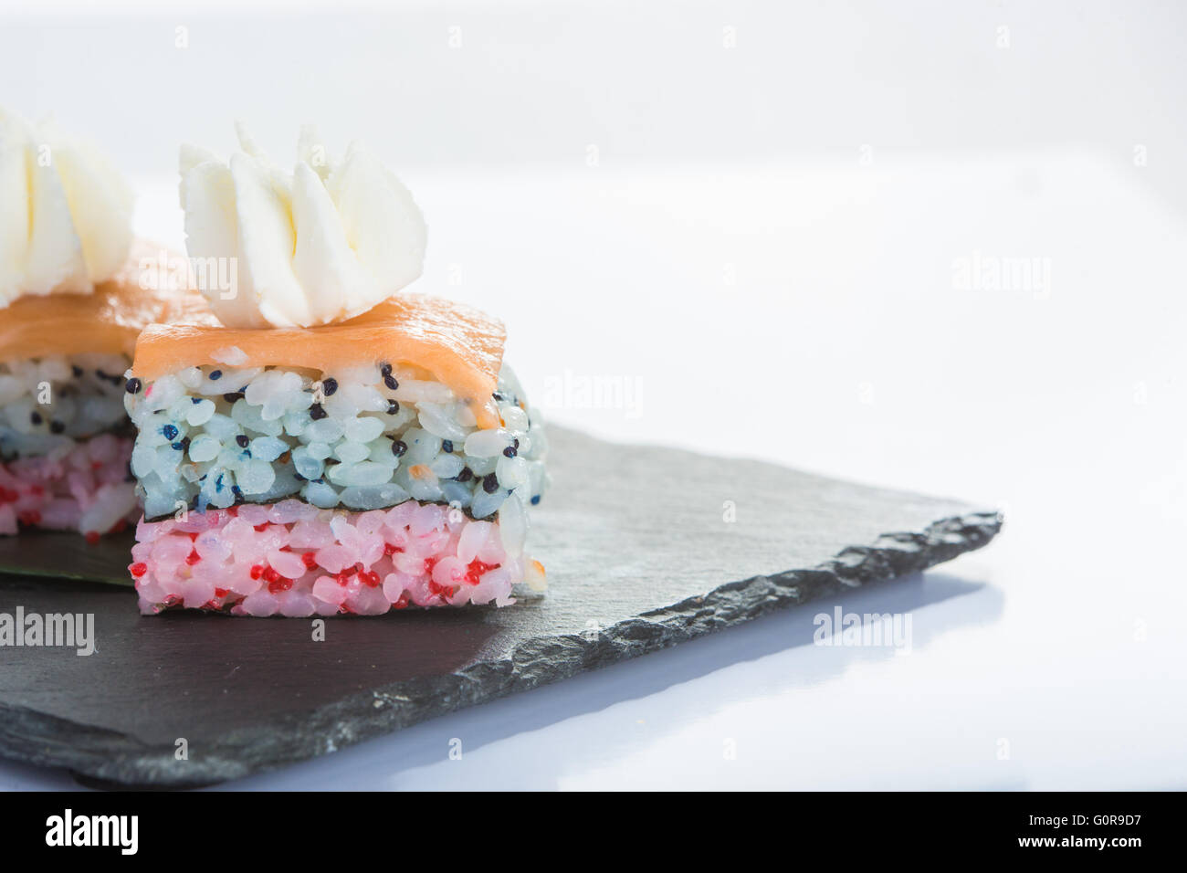 set of sushi on a slate square plate Stock Photo - Alamy