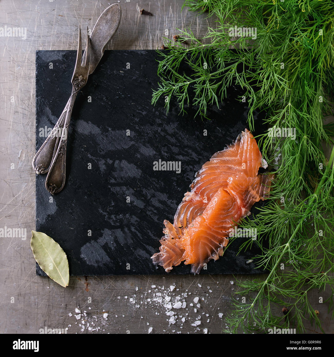 Salted salmon with dill Stock Photo - Alamy