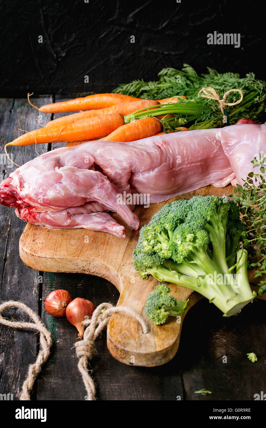Raw rabbit with vegetables Stock Photo - Alamy