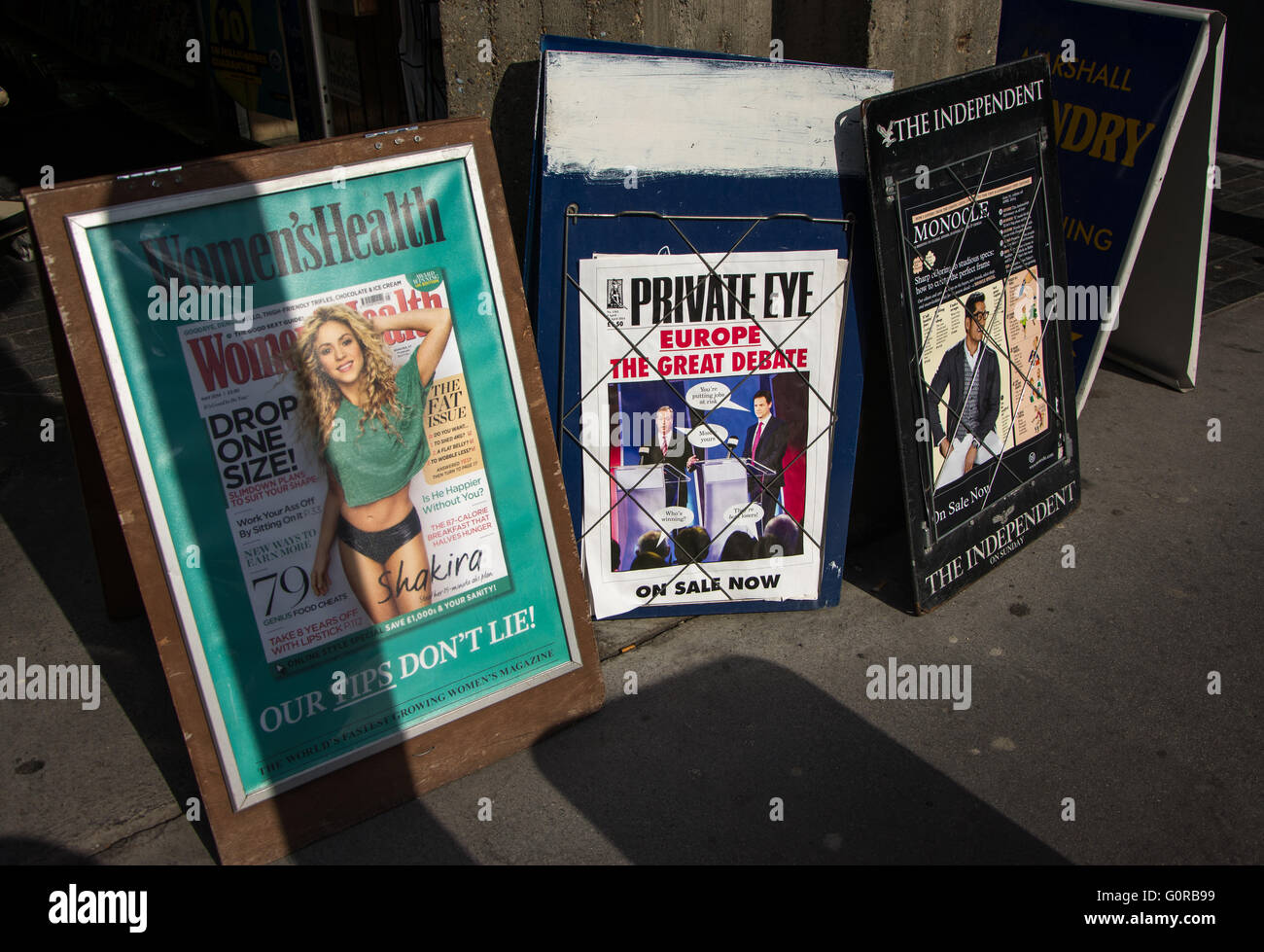 Magazine advertisements in Soho, West London Stock Photo - Alamy
