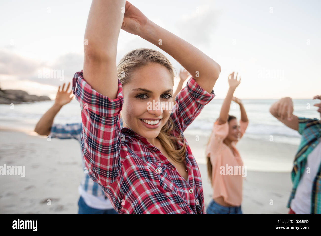 Friends having fun and dancing Stock Photo - Alamy
