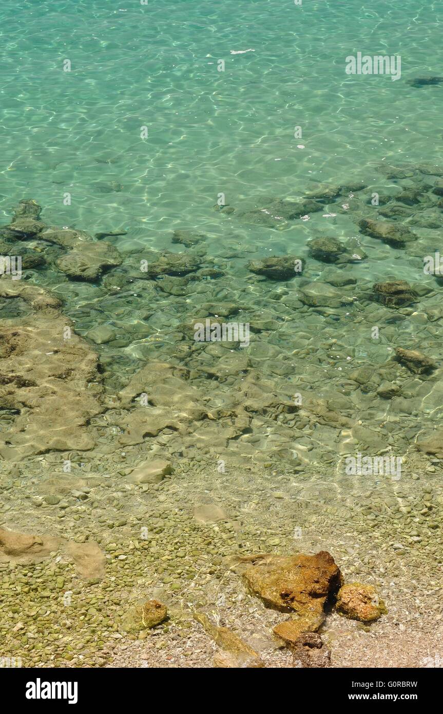Crystal clear sea at beach Zlatni rat (Golden Cape) in Bol on island ...