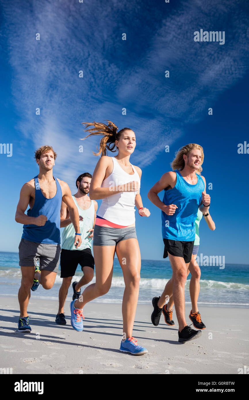Jogging on the beach hi-res stock photography and images - Alamy