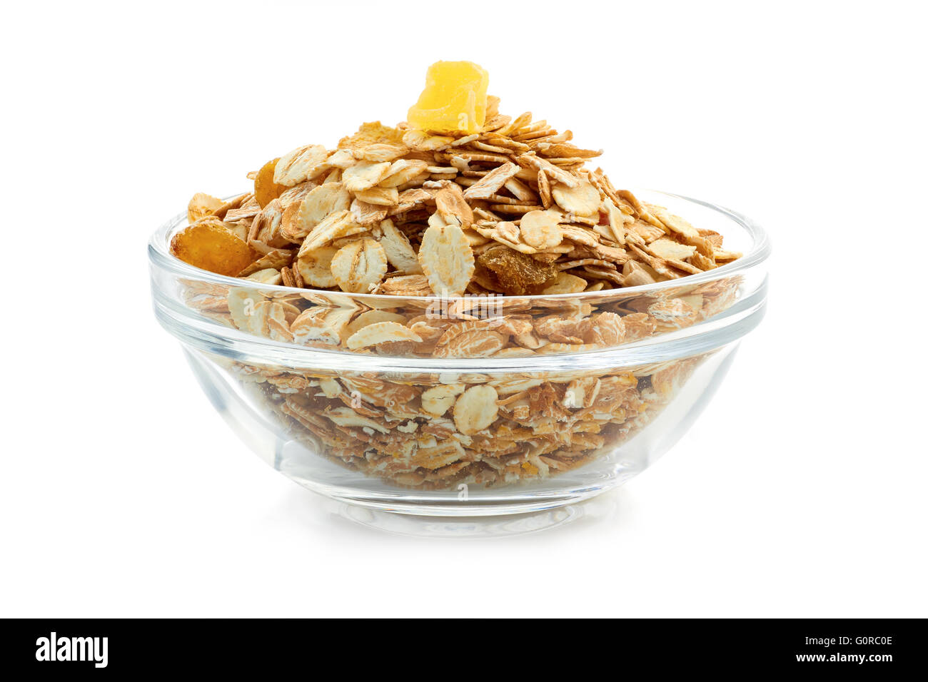 Muesli breakfast in glass bowl on white background Stock Photo - Alamy