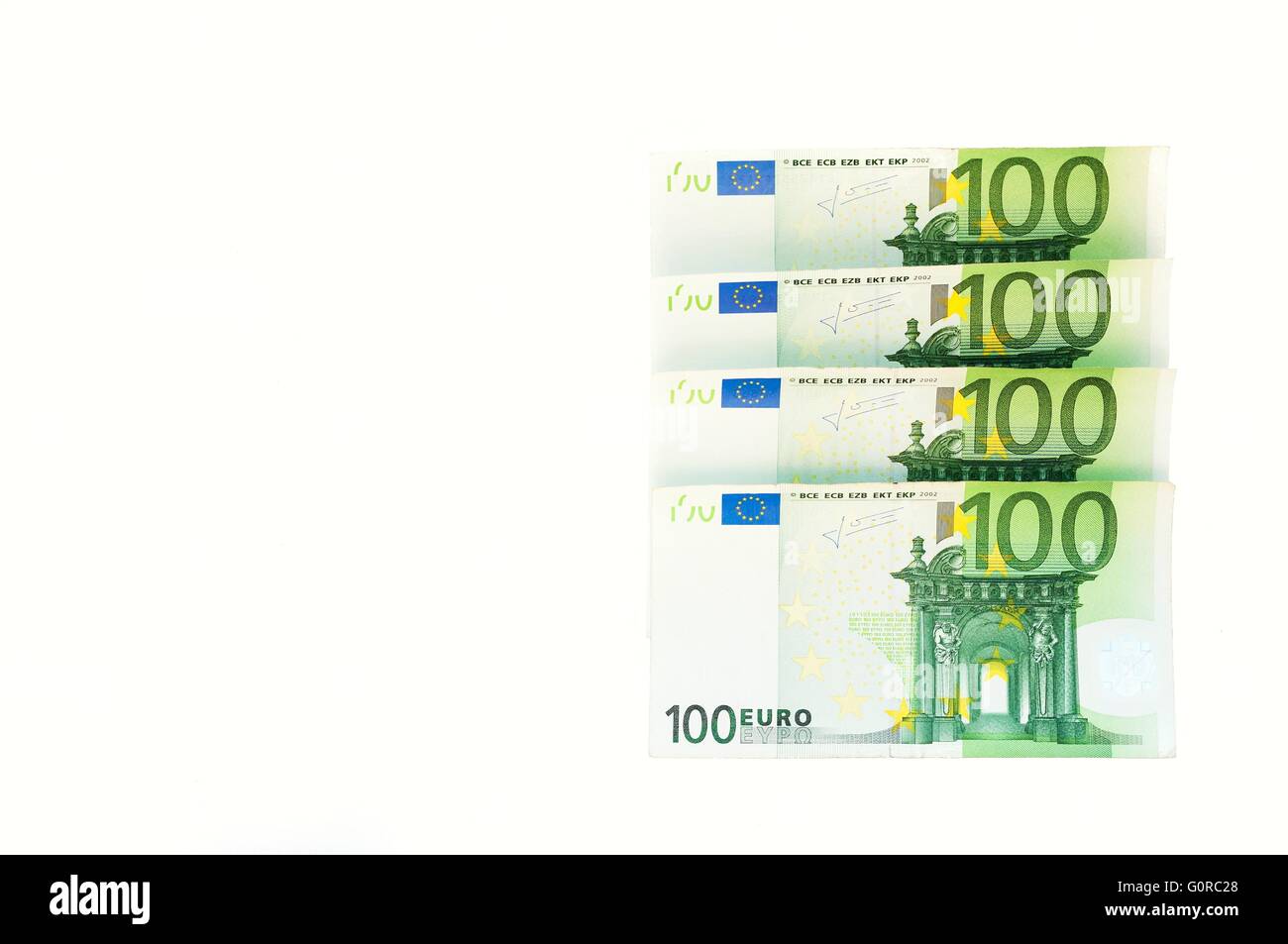 100 Euro banknotes isolated on white background. Space on left side ...