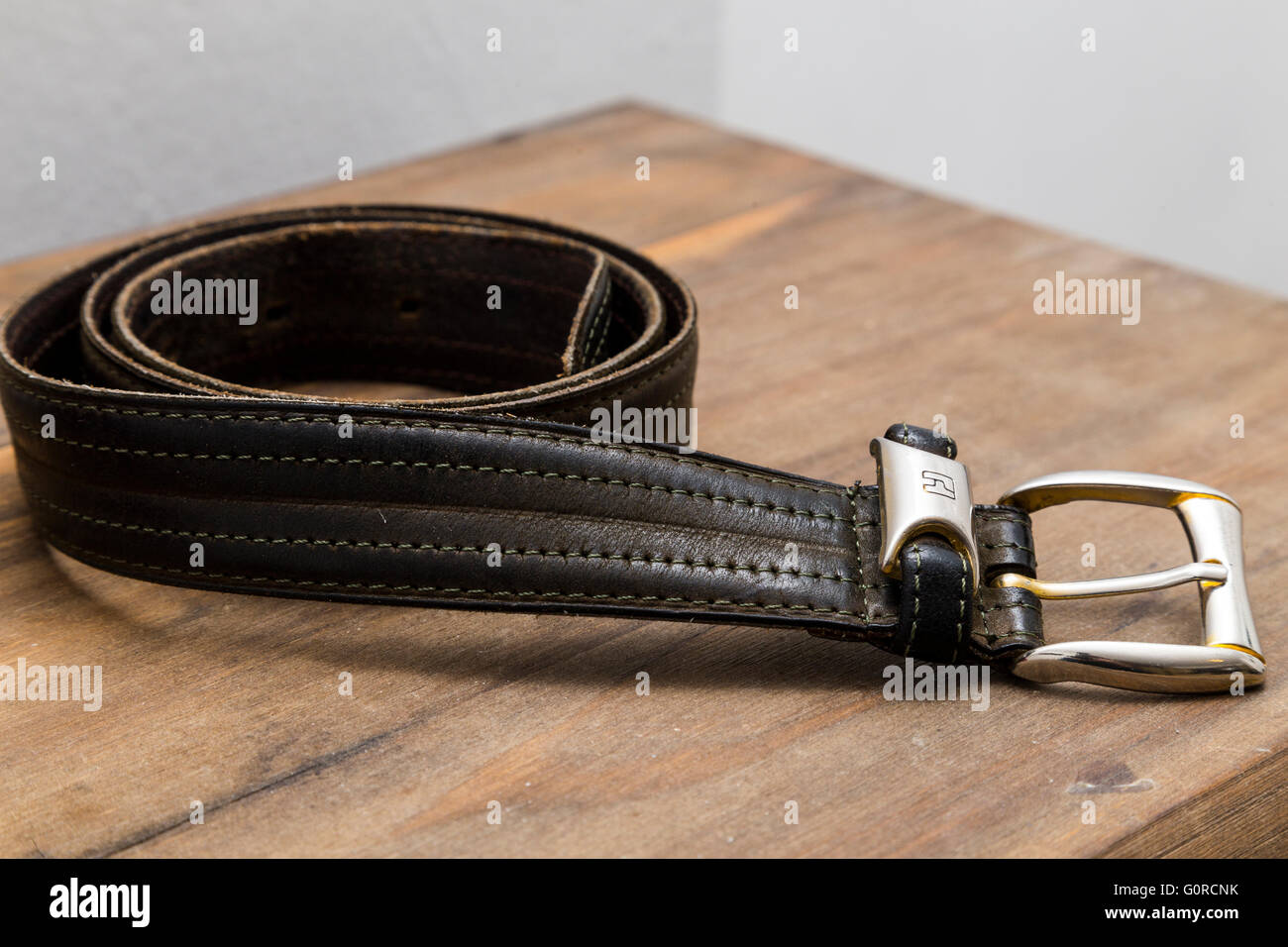 Belt over a bedside table Stock Photo - Alamy