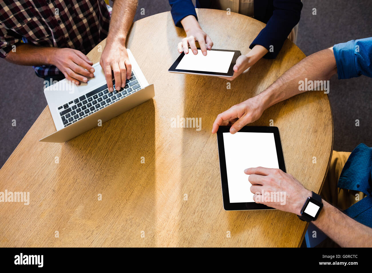 Colleagues using technology Stock Photo - Alamy