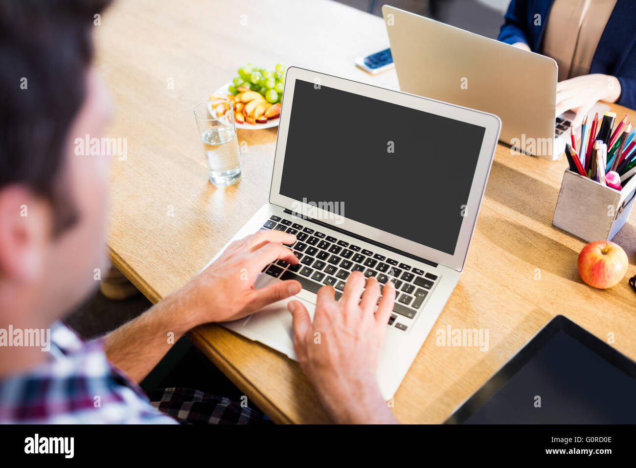 Man working at computer Stock Photo - Alamy