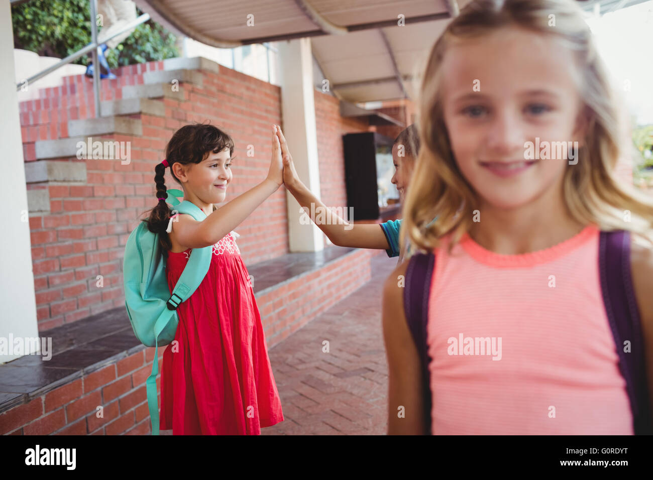 Happy kids at elementary school hi-res stock photography and images - Alamy